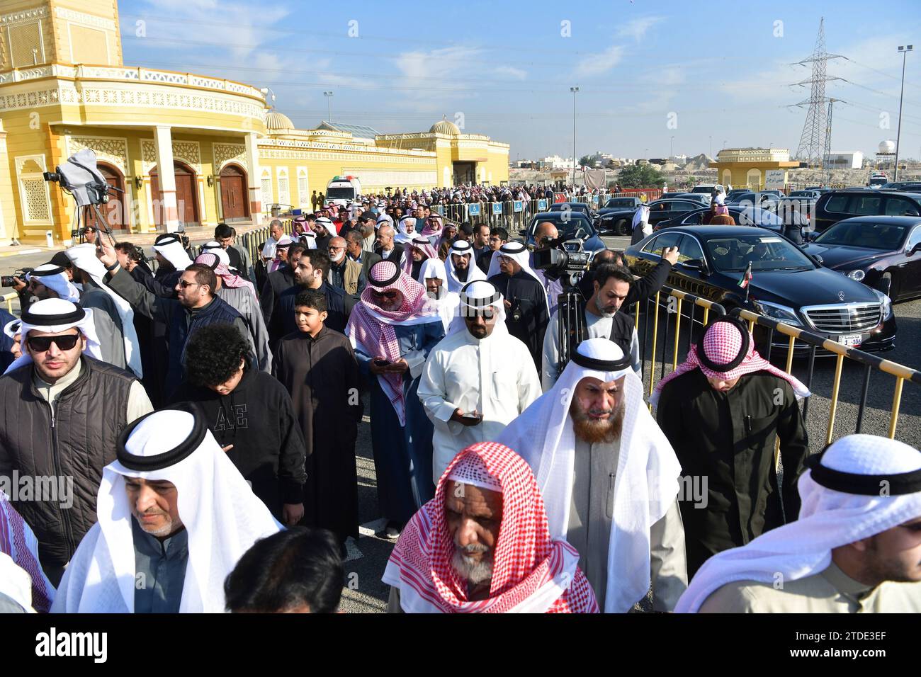 People leave after the funeral ceremony of the Emir of Kuwait Sheikh ...