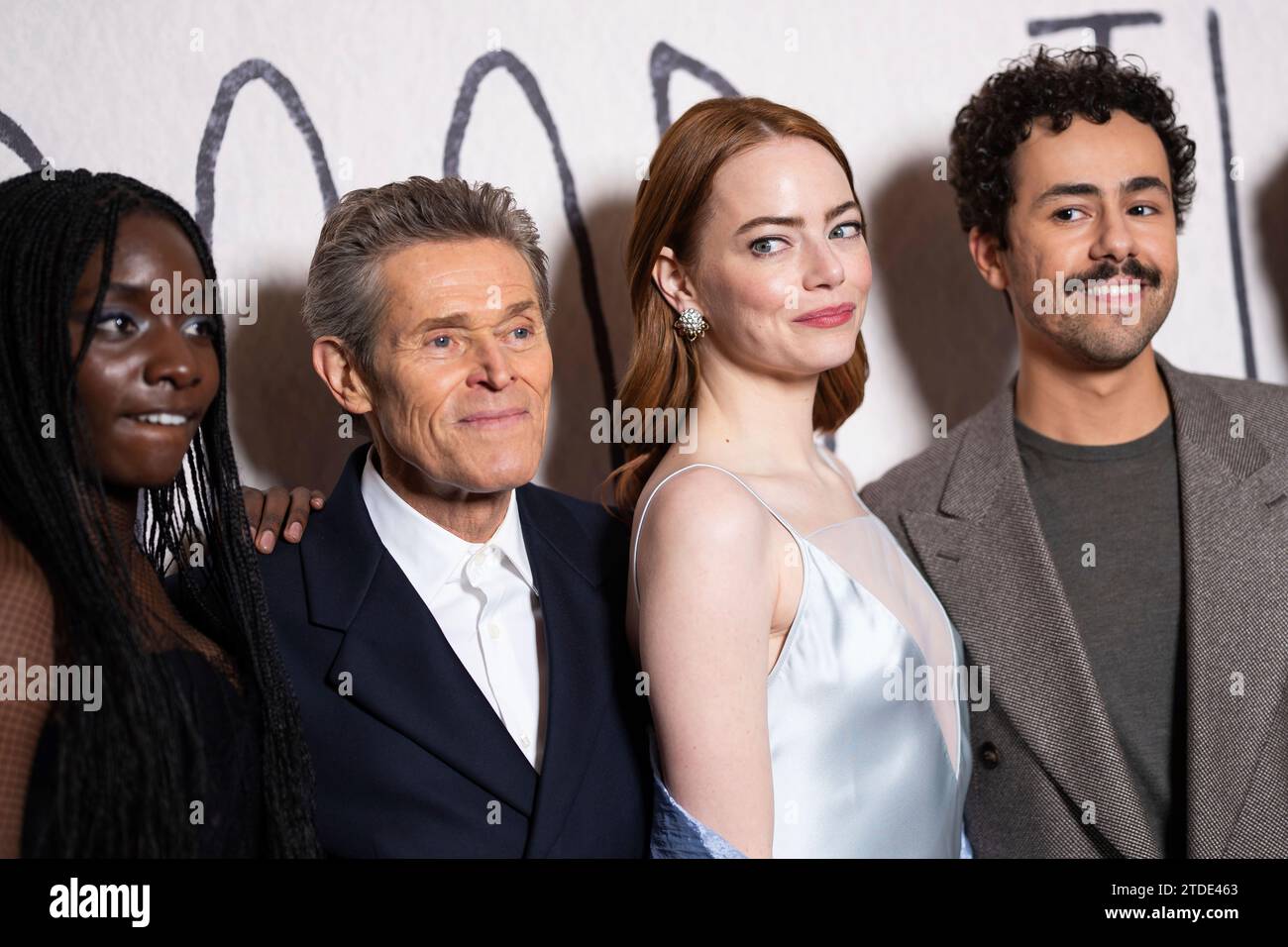Suzy Bemba, from left, Willem Dafoe, Emma Stone, and Ramy Youssef pose for photographers upon ...