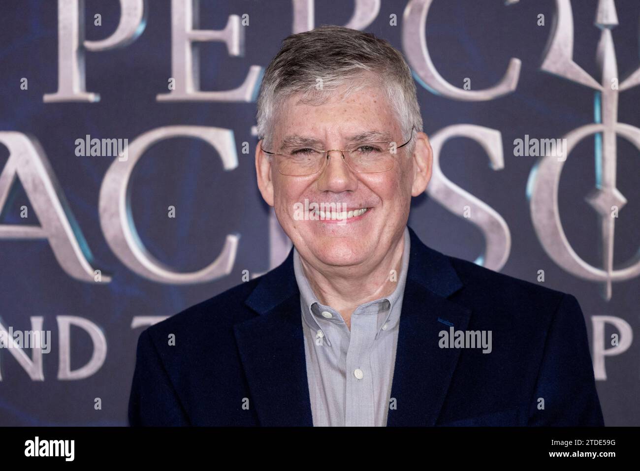 Rick Riordan poses for photographers upon arrival at the premiere of ...