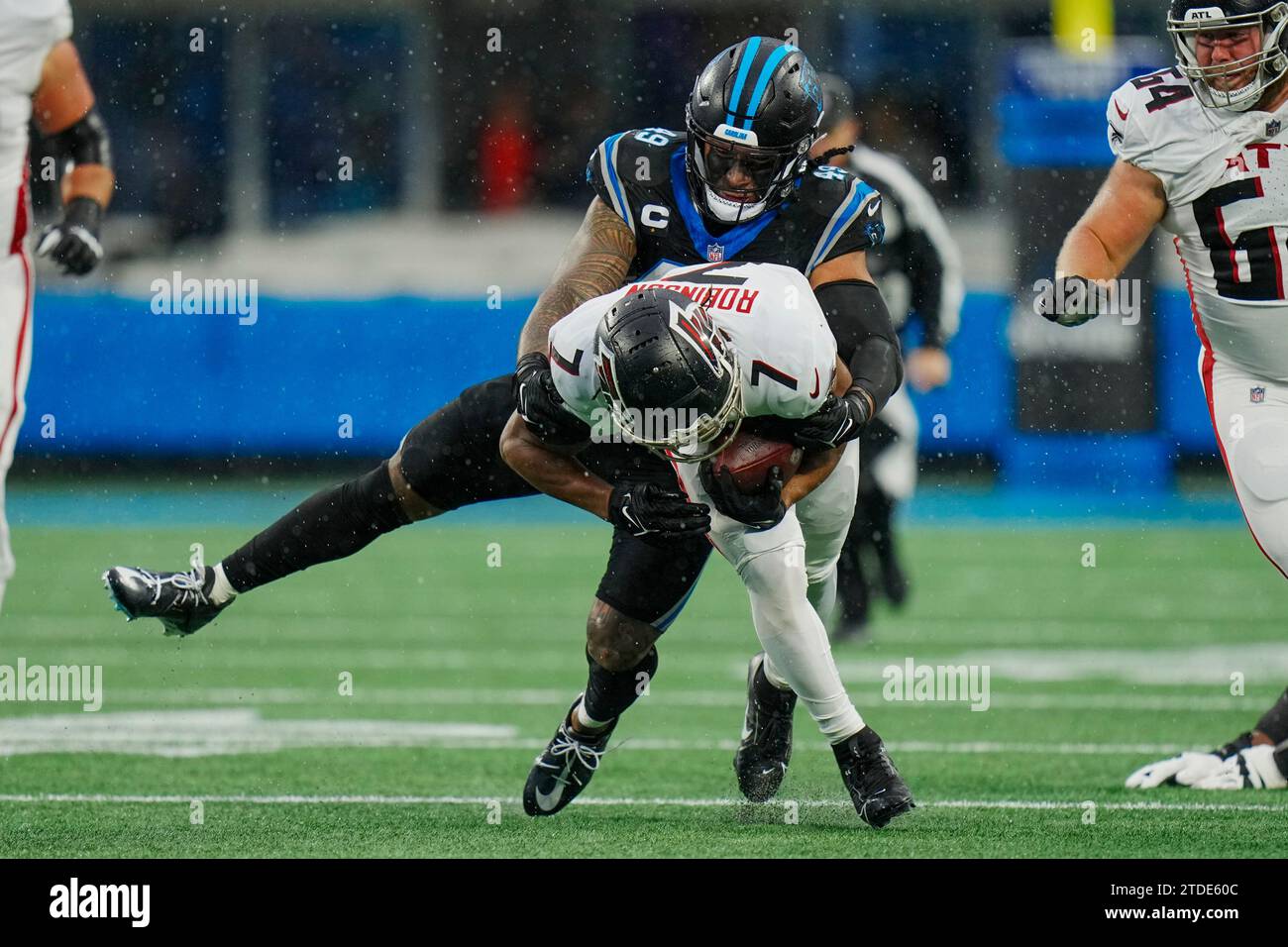 Atlanta Falcons running back Bijan Robinson is tackled by Carolina ...