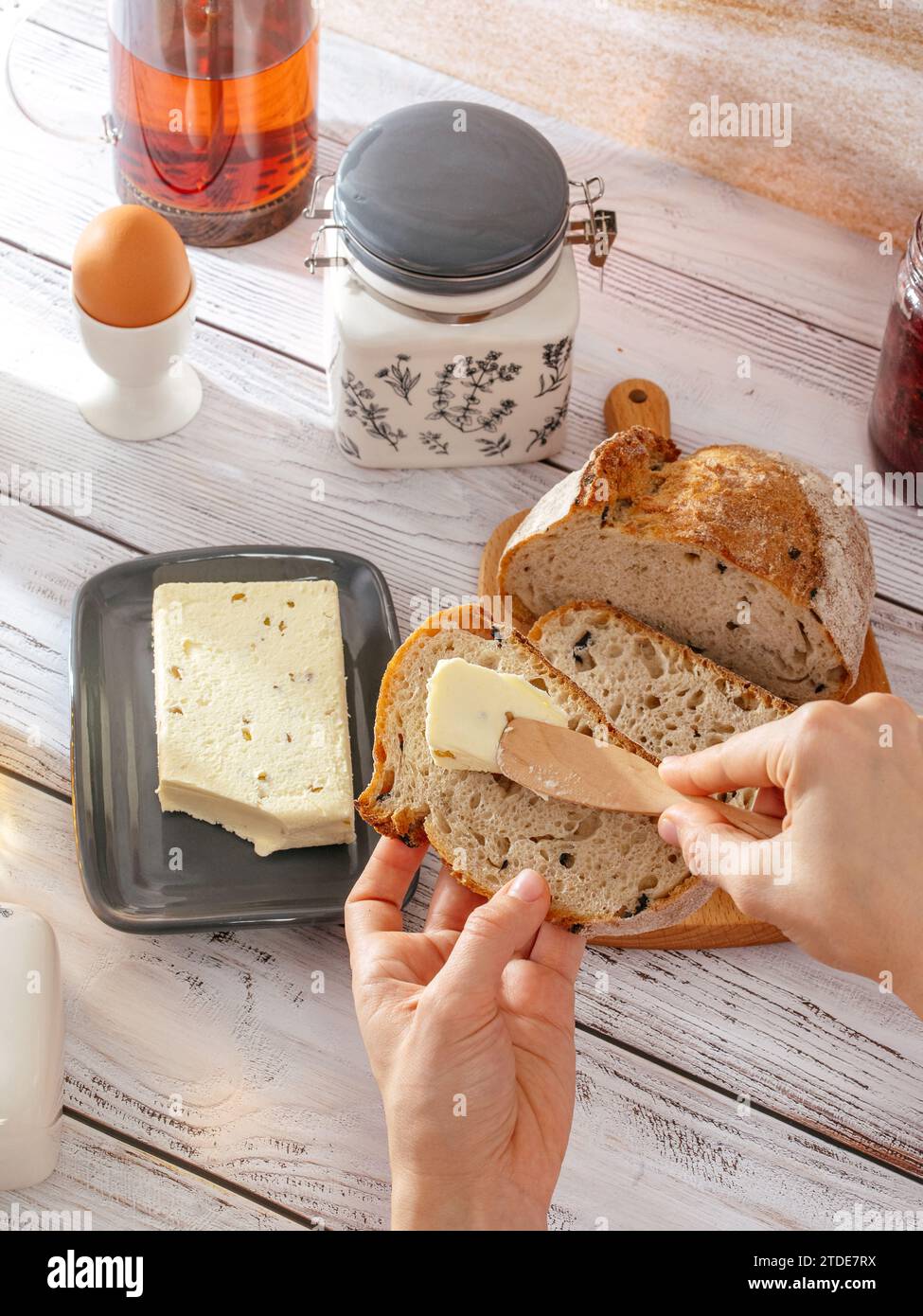 Spread butter on bread hi-res stock photography and images - Alamy