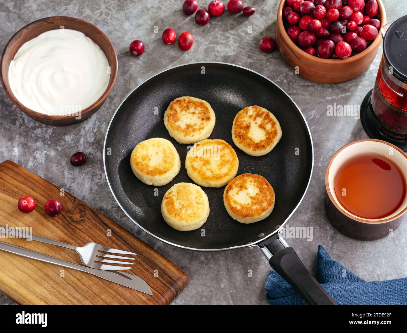 Frying cottage cheese pancakes in hi-res stock photography and images ...