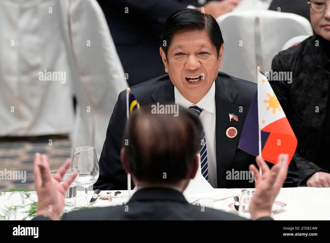 Philippines' President Ferdinand Marcos Jr., top, speaks with Malaysia ...