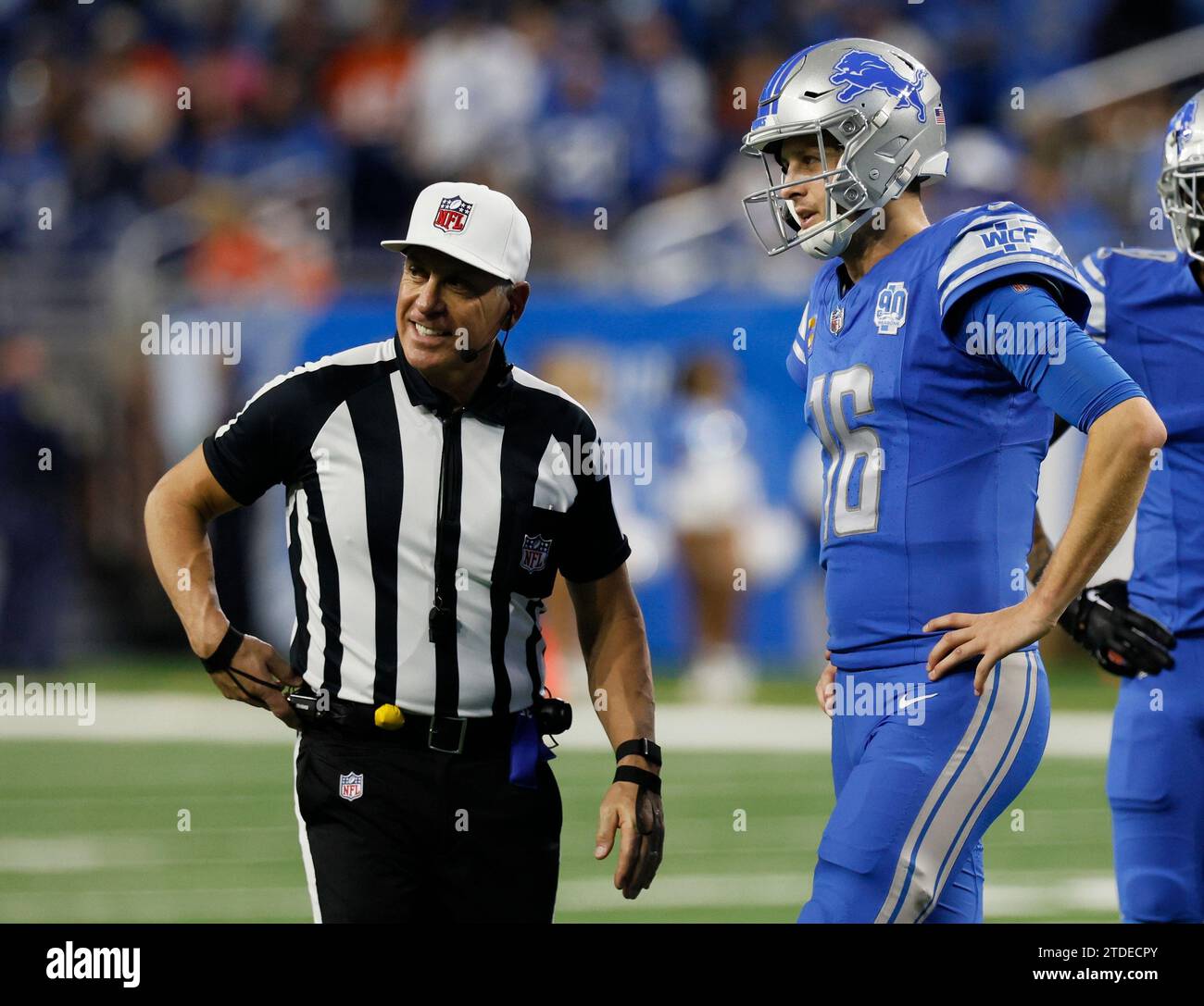 Referee John Hussey (35) talks with Detroit Lions quarterback Jared ...