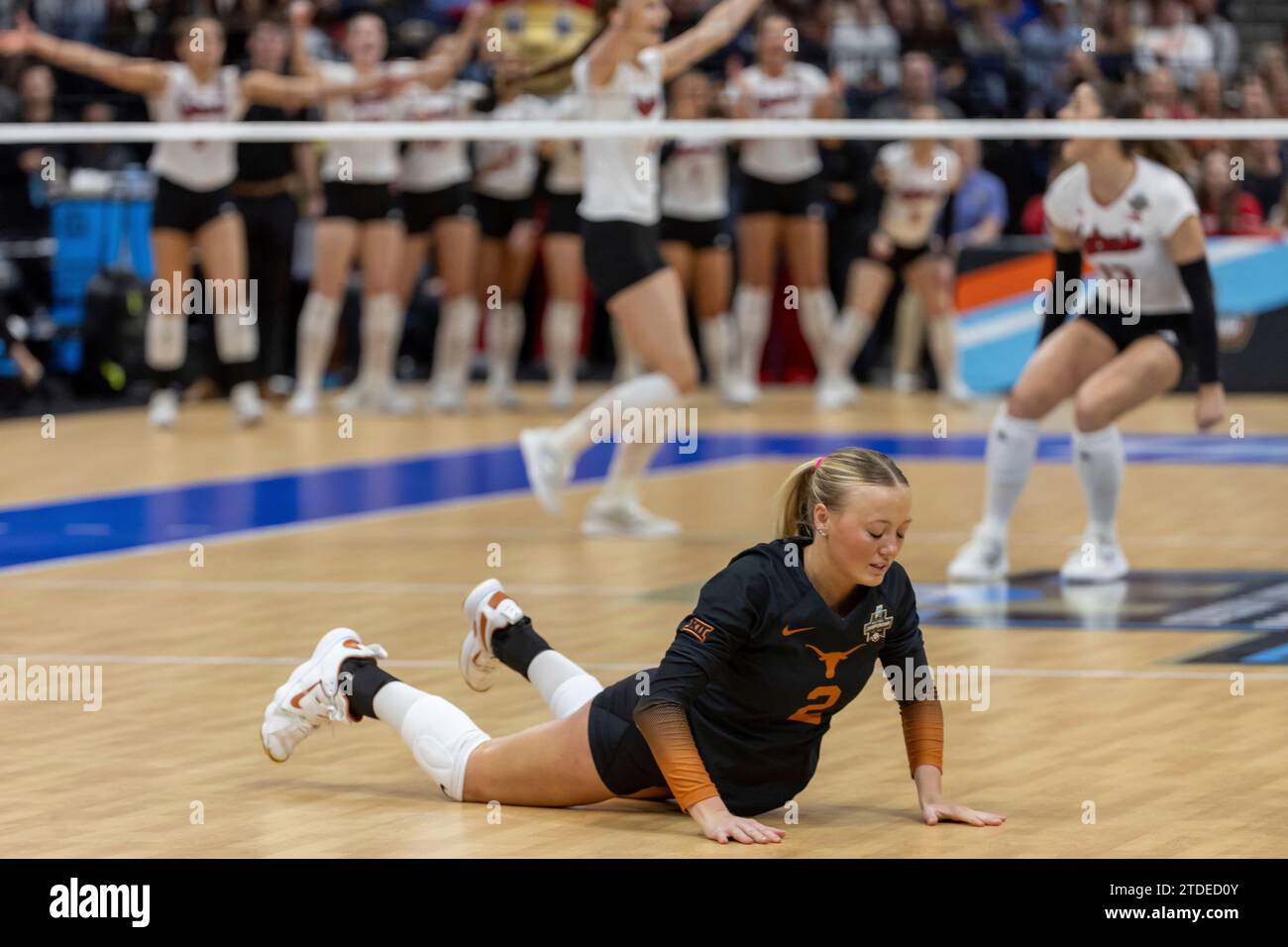 TAMPA, FL - DECEMBER 17: Texas libero Emma Halter (2) lays on the court ...