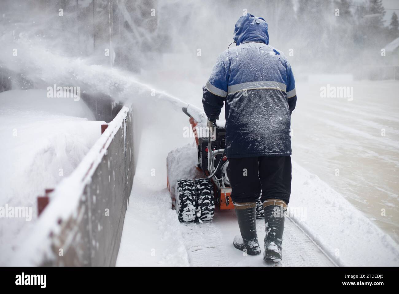 Snow removal equipment at stadium. Ice cleaning Stock Photo - Alamy