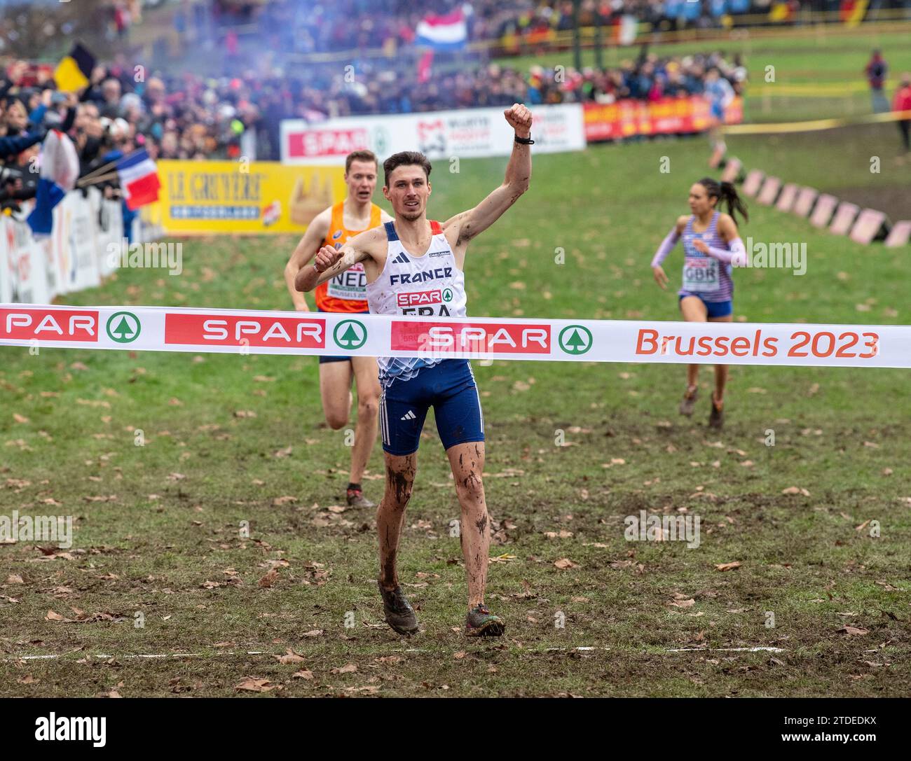 Alexis Miellet of France crosses the finishing line to help his team ...