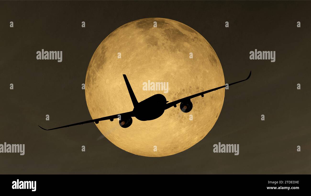 Plane takes off at night before full moon Stock Photo - Alamy