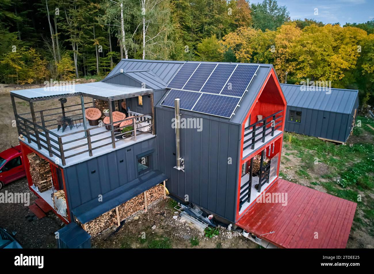 New modern house cottage with solar photovoltaic panel system on roof ...