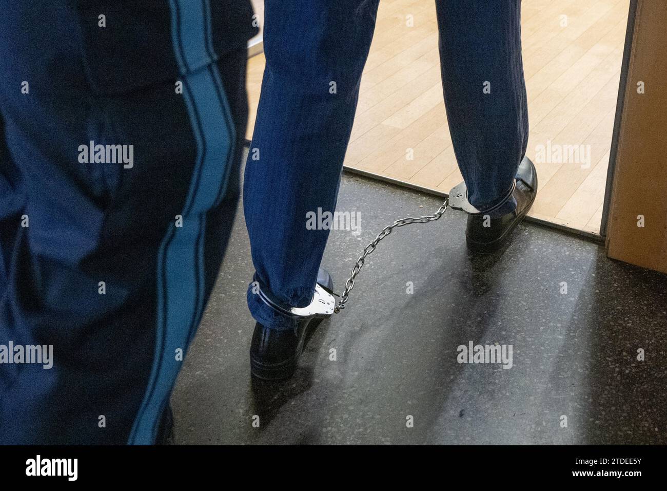 Regensburg, Germany. 18th Dec, 2023. The defendant enters the courtroom ...