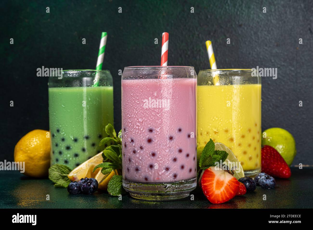 Set of three colorful summer bubble tea, bright creamy pearl tea or ...