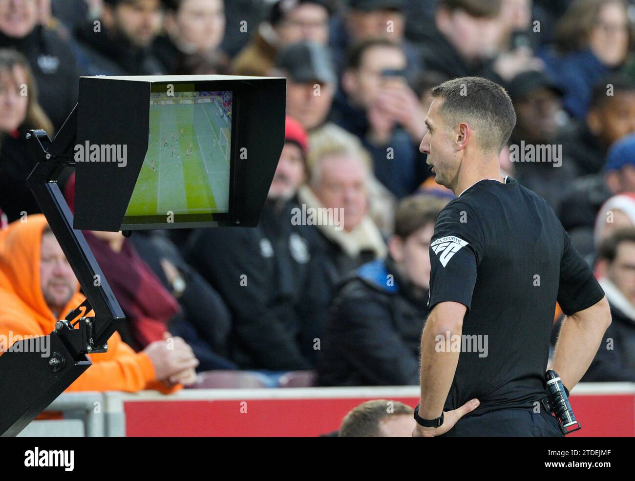 Referee David Coote checks VAR screen during the English Premier League ...