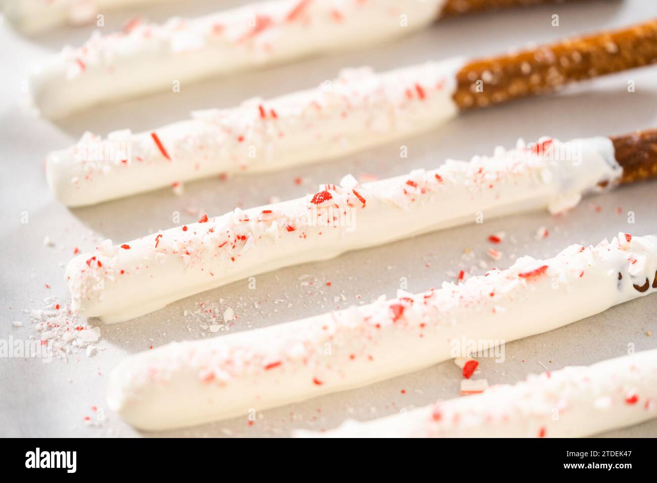 Candy cane chocolate covered pretzel rods Stock Photo - Alamy
