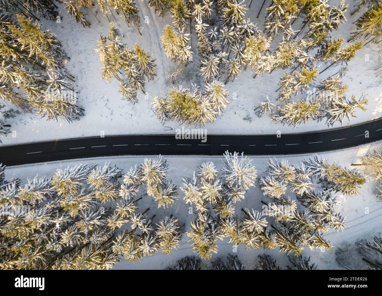 Aerial View of Snowy Curvy Road through Forest in Germany, Europe Stock ...