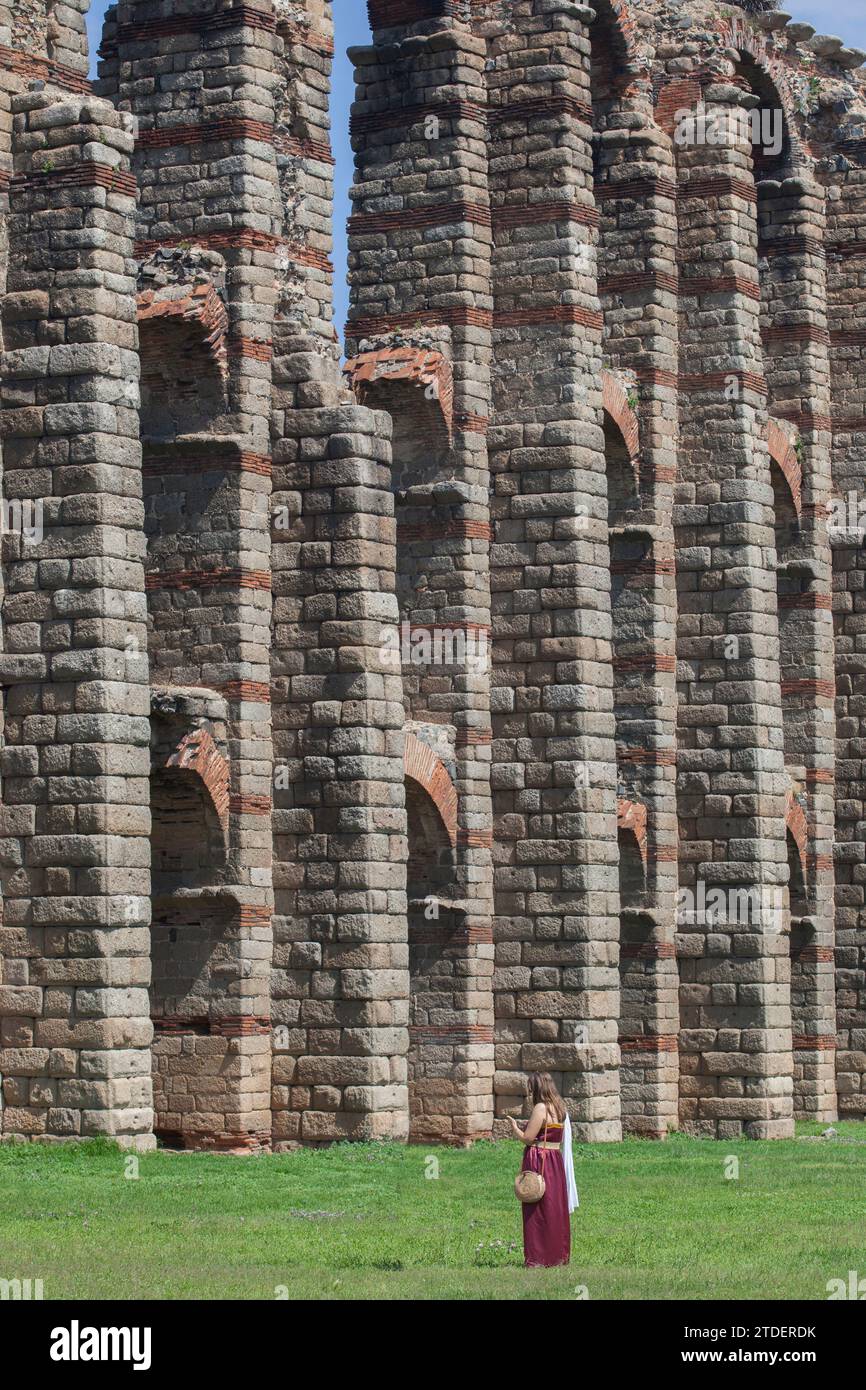 Merida, Spain - June 4th, 2023: Young reenactor woman beside Los ...