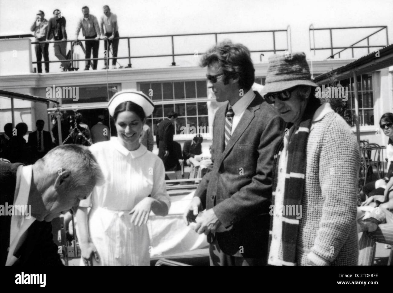 CLINT EASTWOOD and Director DON SIEGEL on set location candid photo in ...