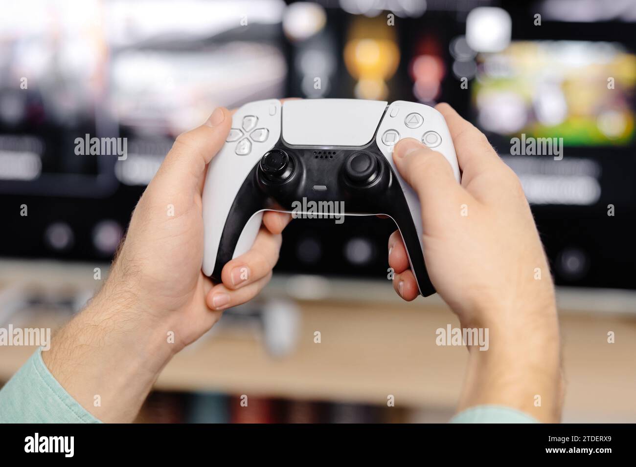 Gamer holding game pad hi-res stock photography and images - Alamy