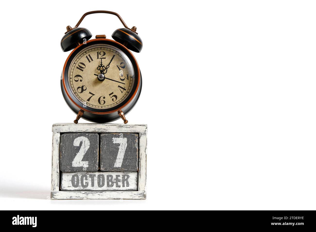 October 27 on wooden calendar with alarm clock white background Stock ...