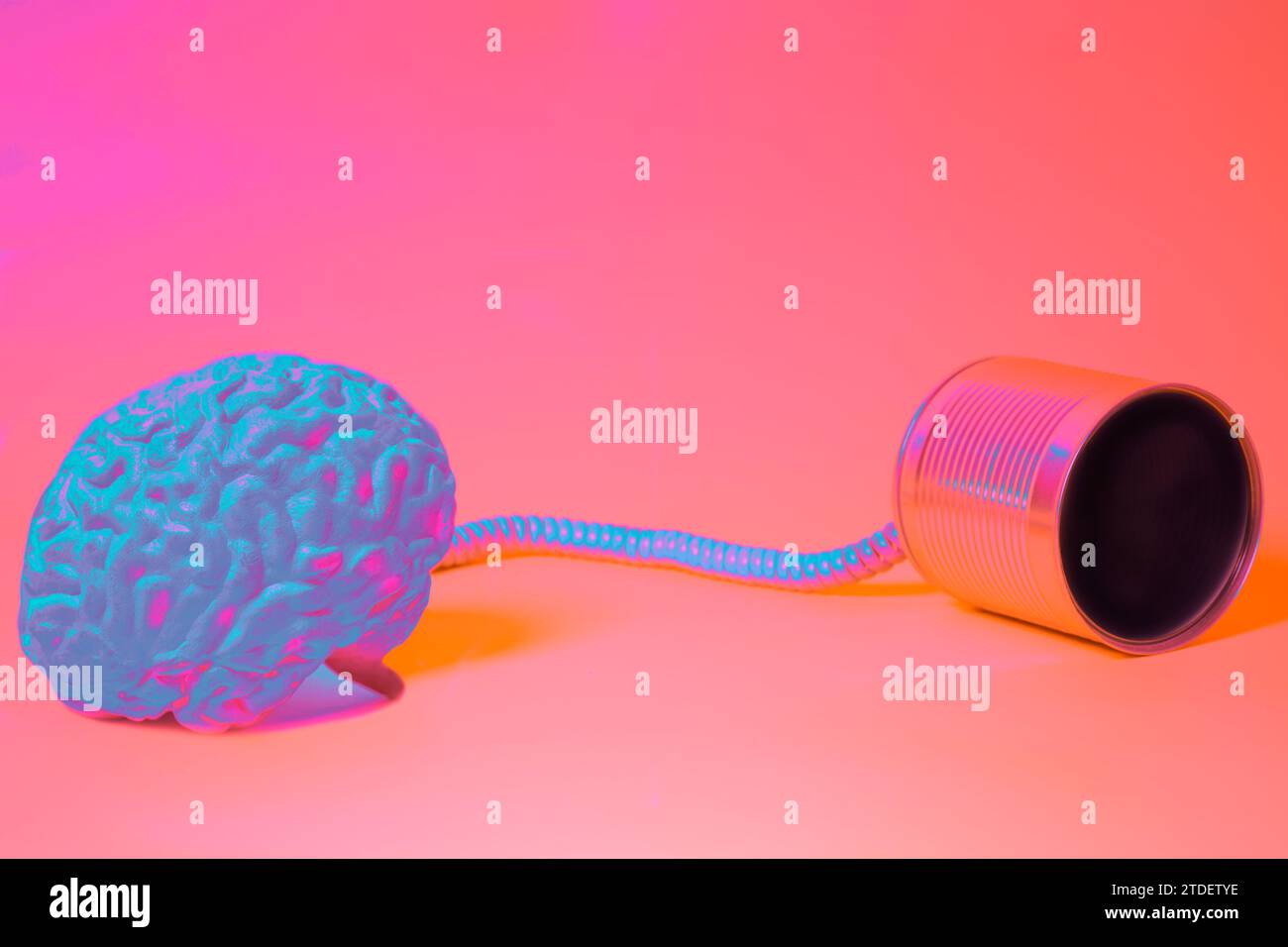 tin can phone with human brain anatomical model. communication concept ...