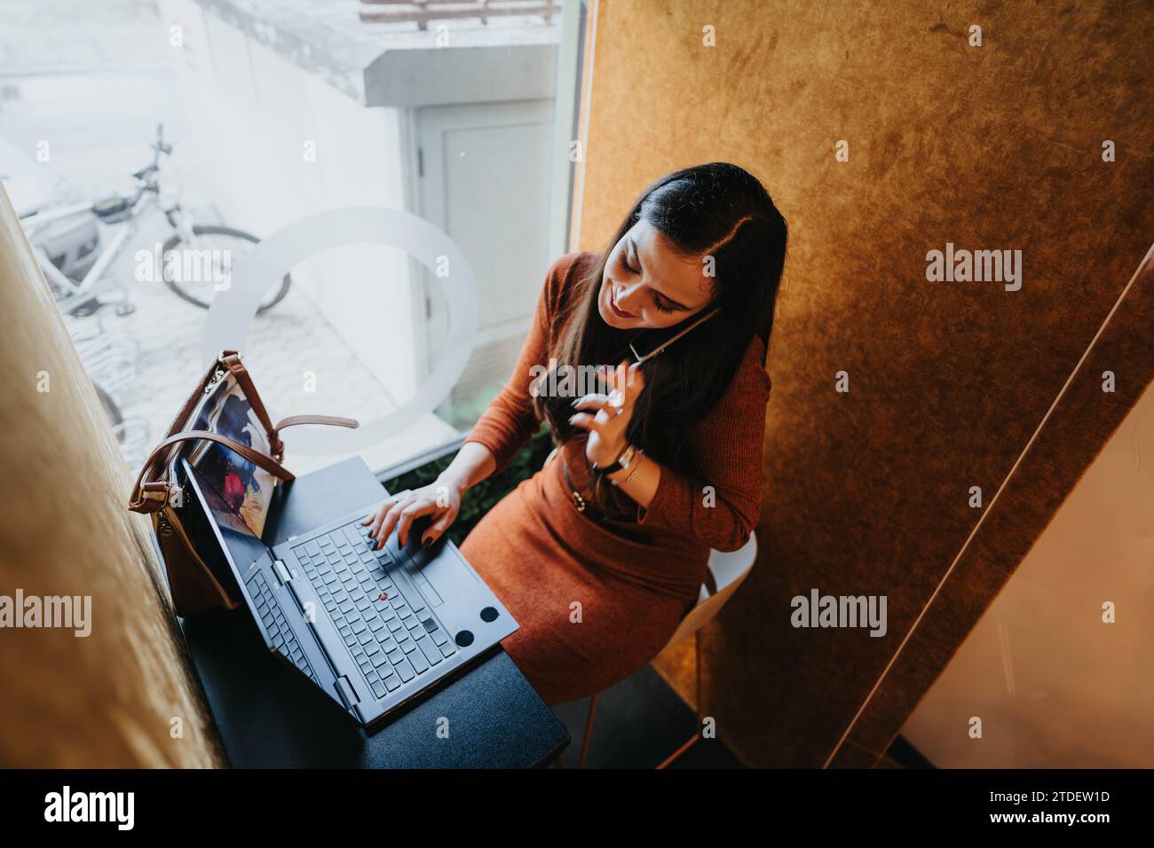 Successful Businesswoman Negotiating Project Costs in Office Phone ...