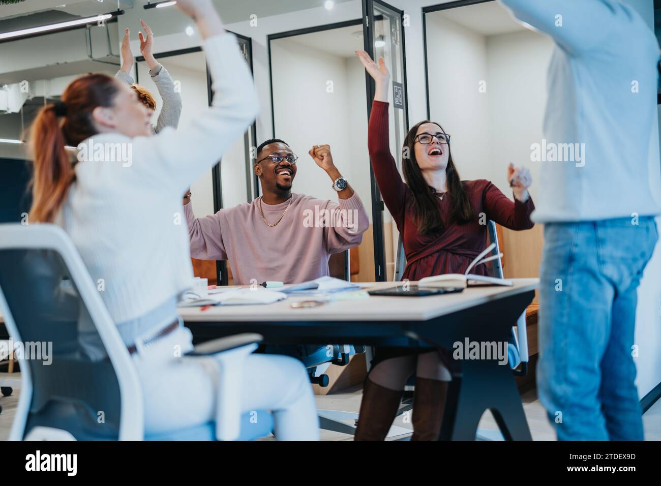Group of business people celebrating successfully finished work ...