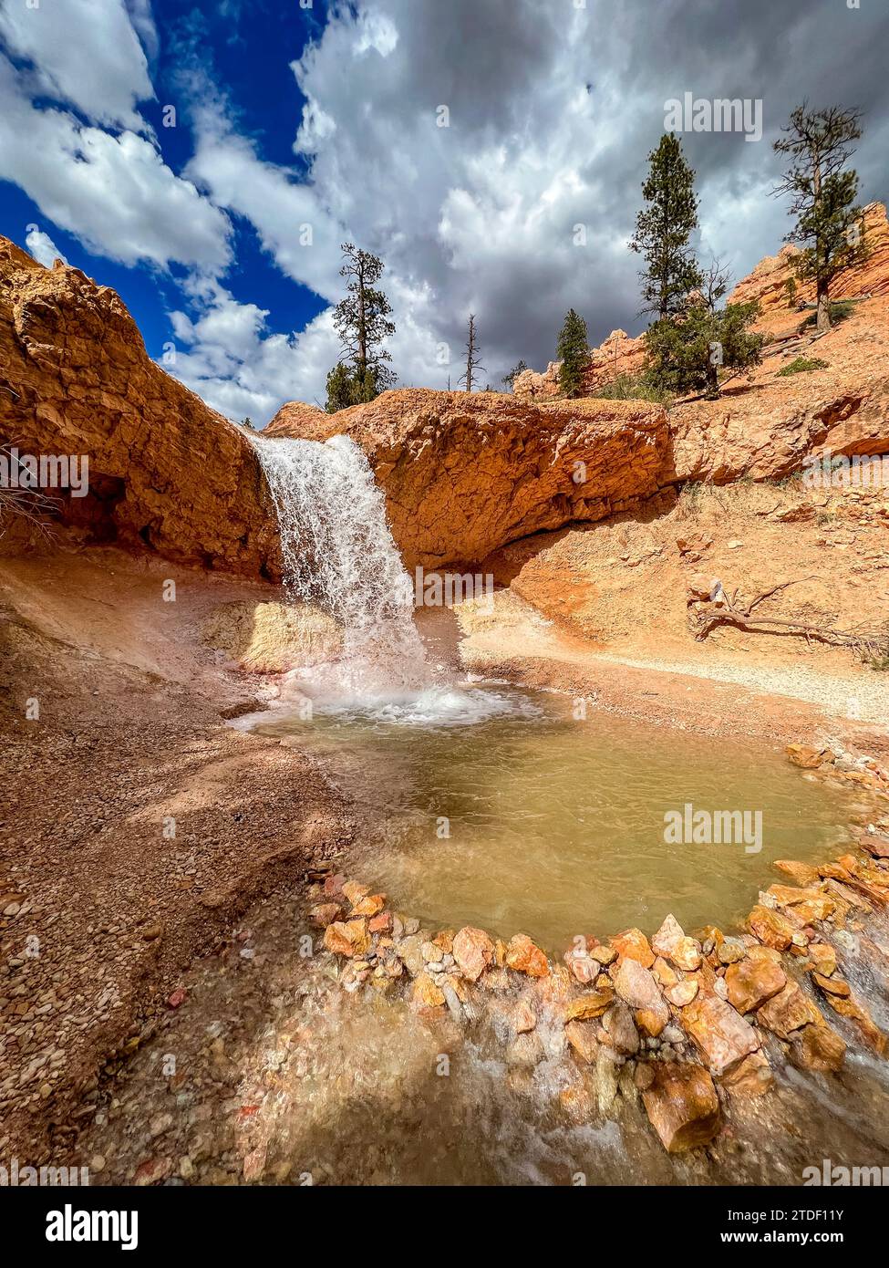 A waterfall running through the Mossy Cave Trail in Bryce Canyon ...