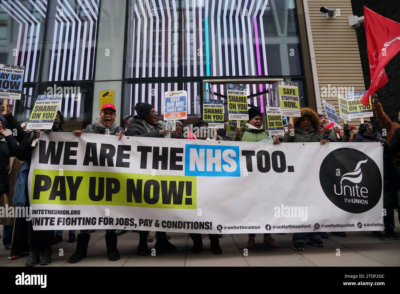 Representatives from Unite the union protest outside the Department of ...