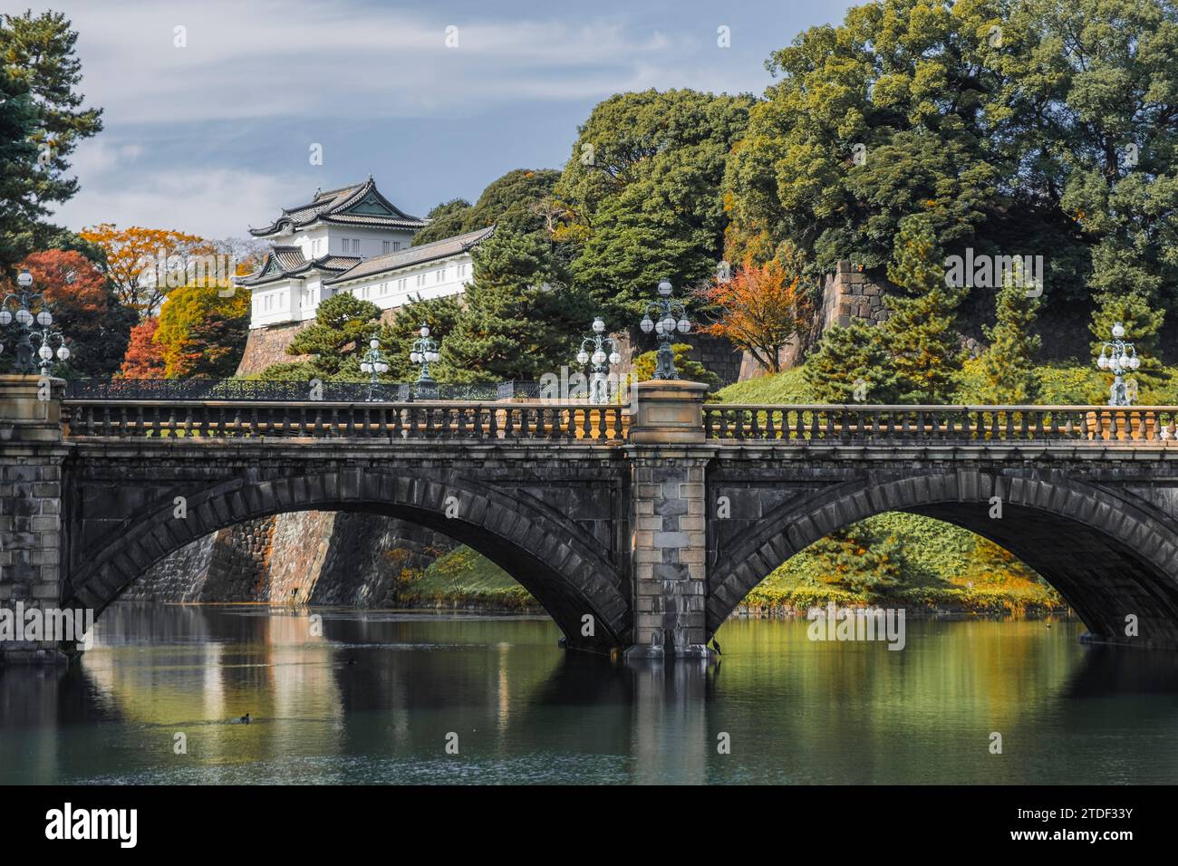 Nijubashi bridge over the moat and a guard tower in the Imperial Palace ...