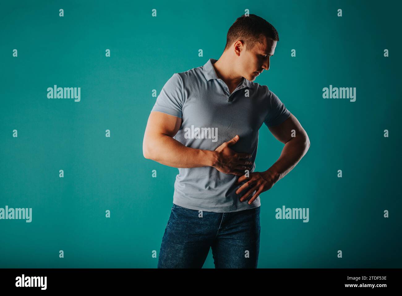 Appealing and well-built man posing Stock Photo - Alamy