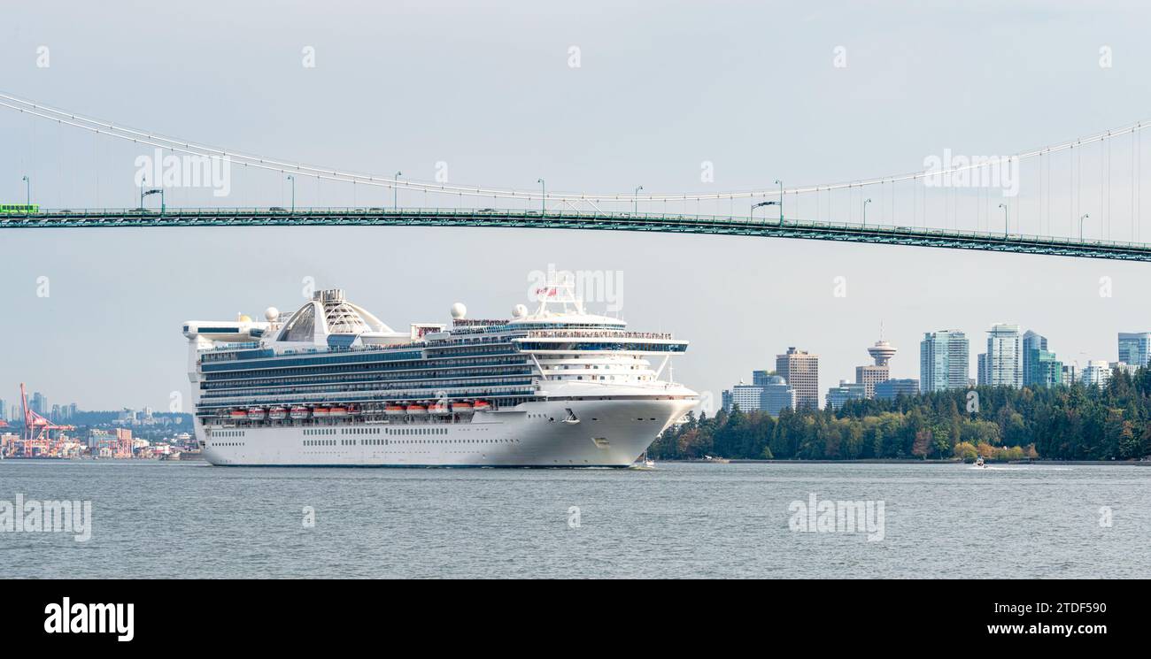 Huge white ocean cruise liner passing famous Lion Gates Bridge Stock ...