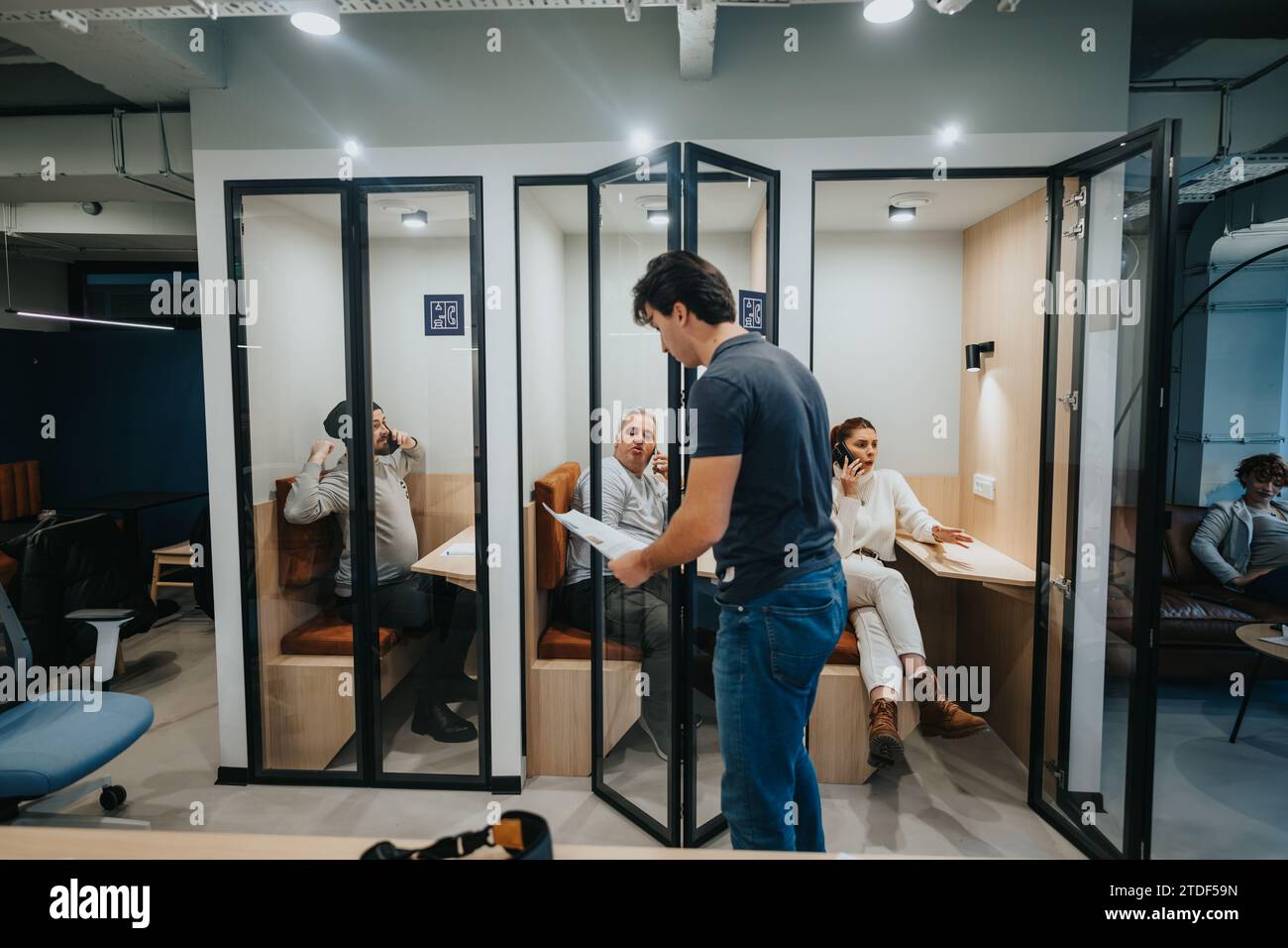 Positive atmosphere of teamwork in a creative office for business ...