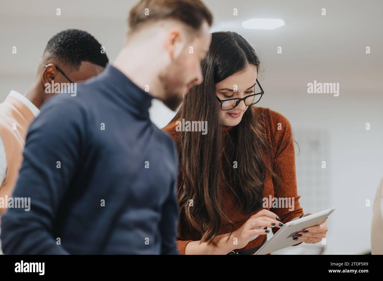 Diverse team collaborating for business growth. Analyzing reports ...