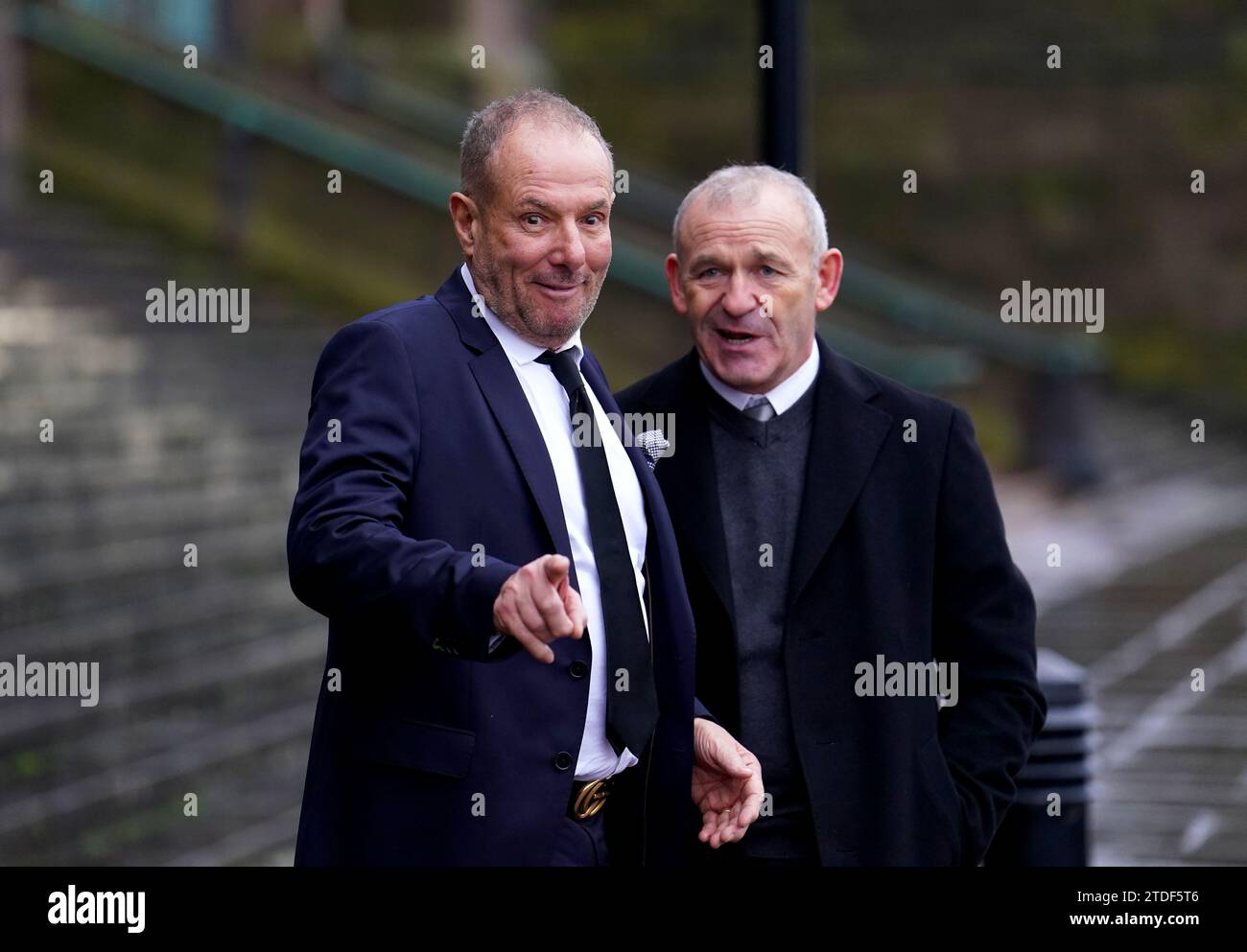 Derek Hatton (left) and former footballer Shaun Reid arrive ahead of a ...