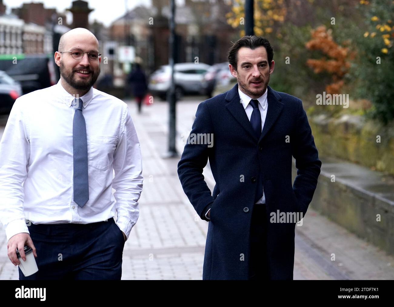 Everton U18 coach Leighton Baines (right) arrives ahead of a memorial ...