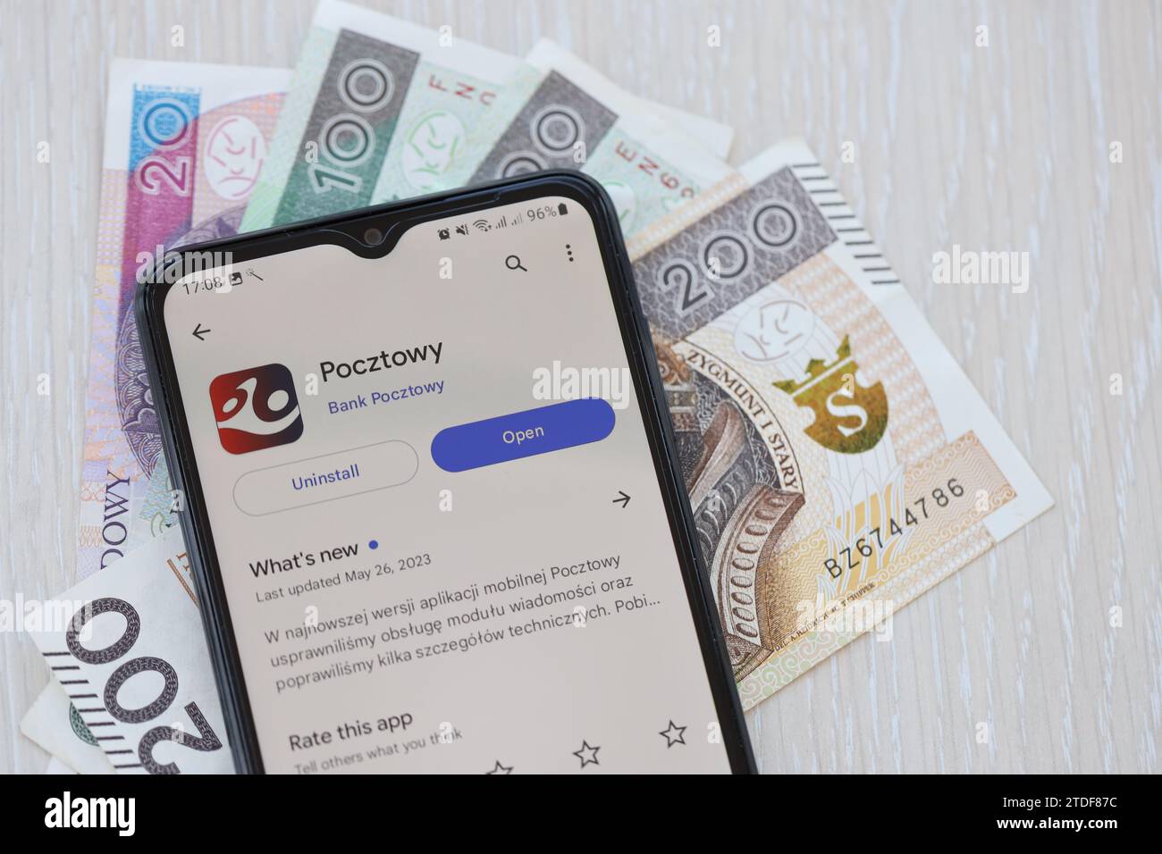 TERNOPIL, UKRAINE - AUGUST 3, 2023 Pocztowy bank application on screen ...