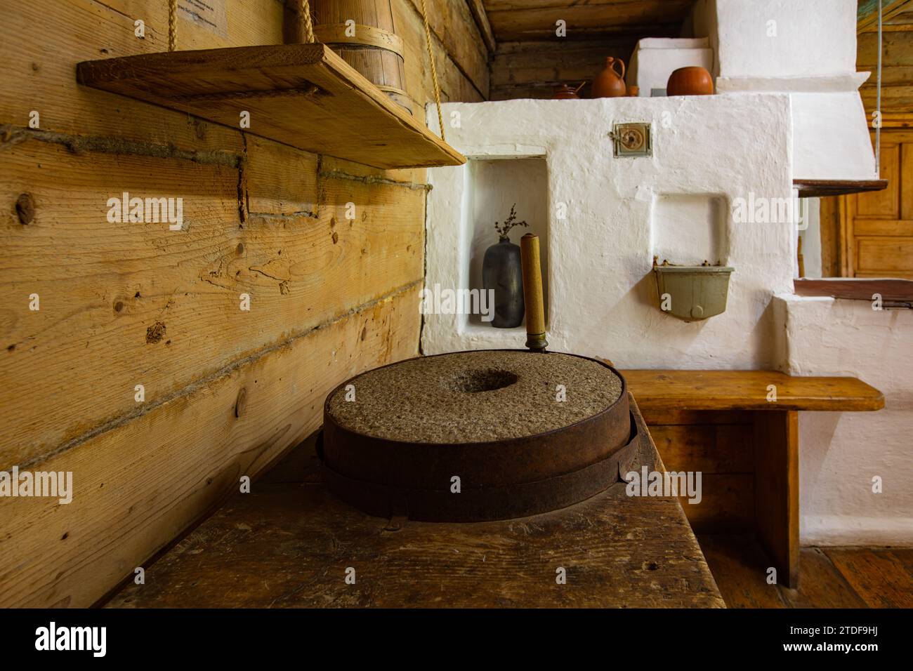 Ancient traditional clay stove in ancient wooden house in Lviv region ...