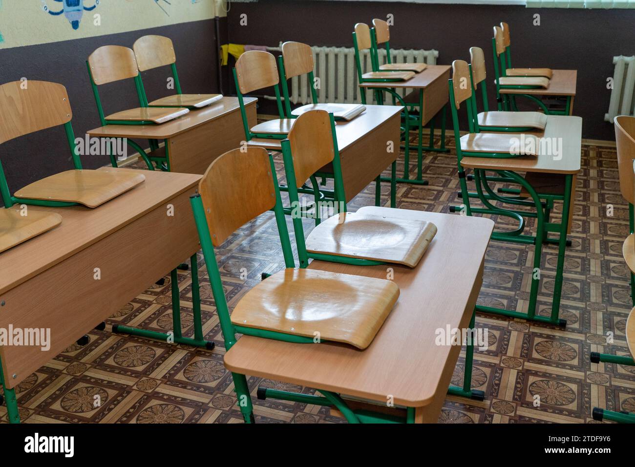 Furniture at school. Empty class. Wooden desks with chair. Double table ...