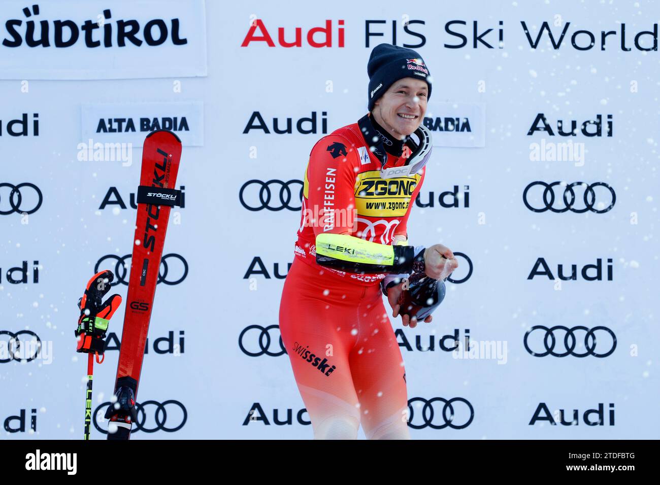 Switzerland's Marco Odermatt celebrates on the podium after winning an ...