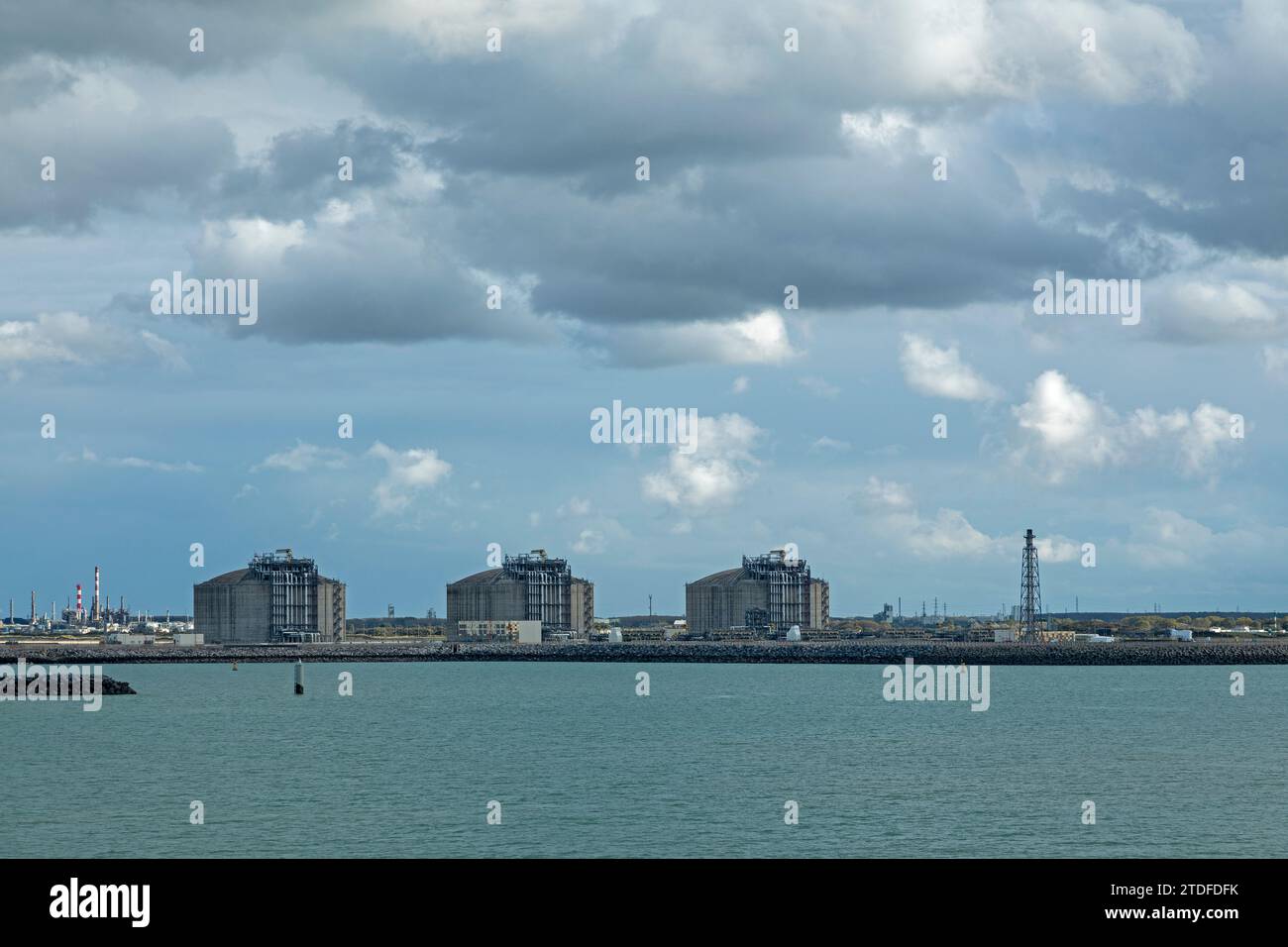 Harbour equipment, clouds, Dunkerque, France Stock Photo - Alamy