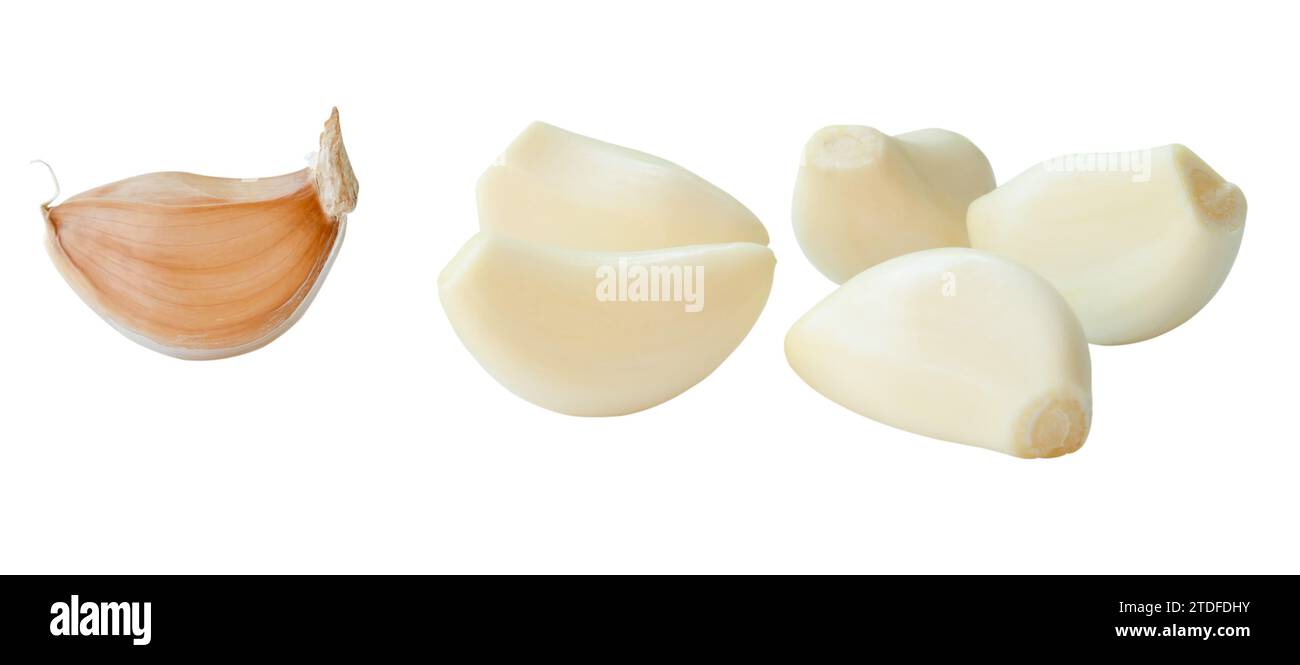 Set of Peeled and unpeeled separated garlic cloves is isolated on white ...