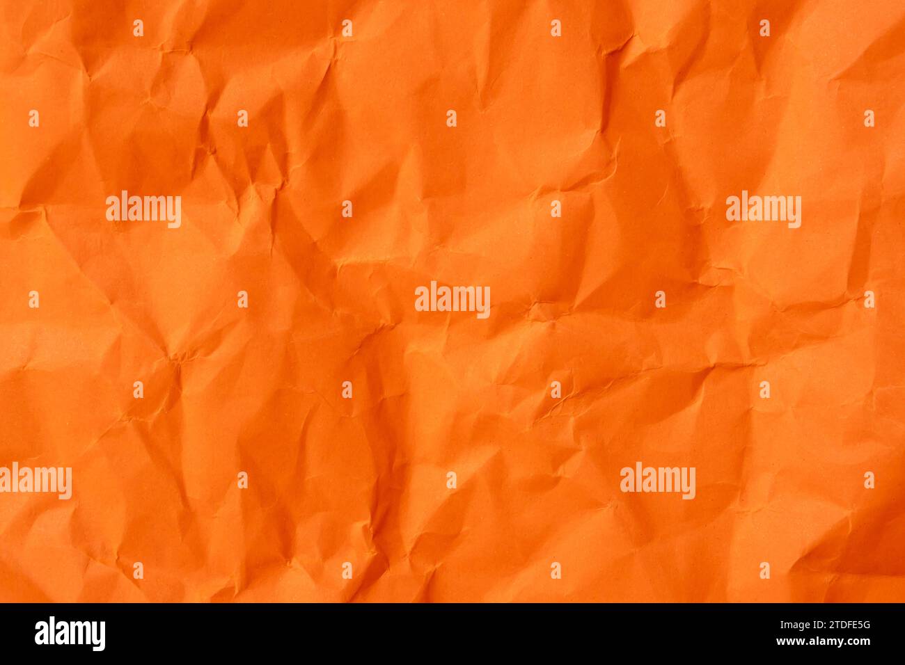 Orange crumpled paper texture is used for paper background texture in ...