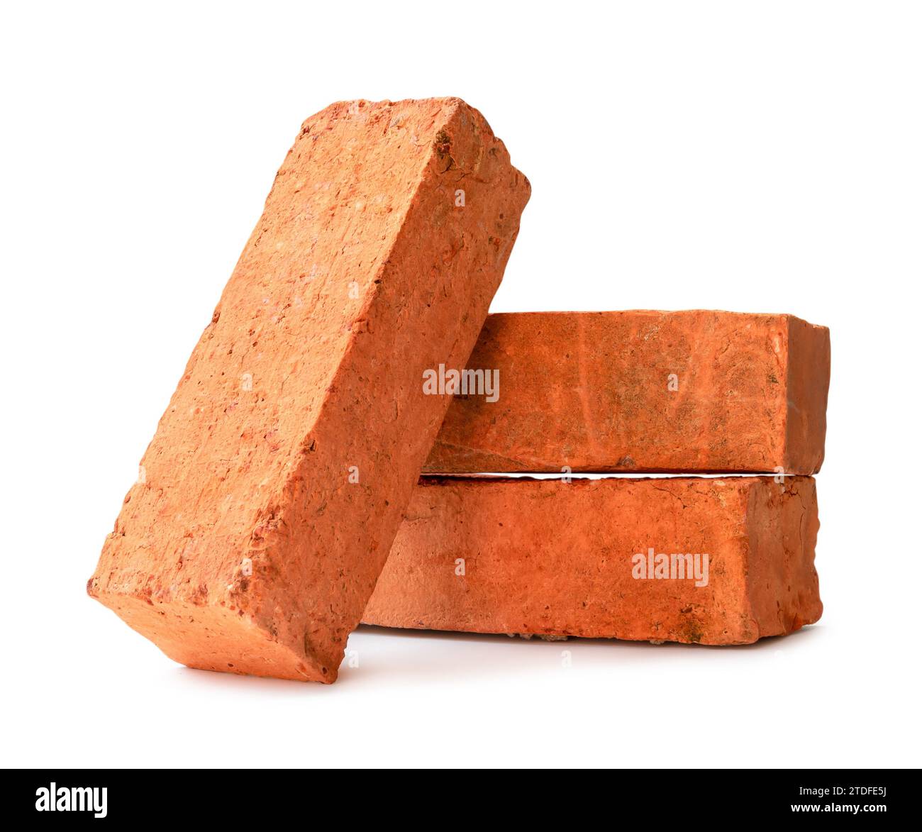 Cracked old red or orange bricks in stack are isolated on white ...