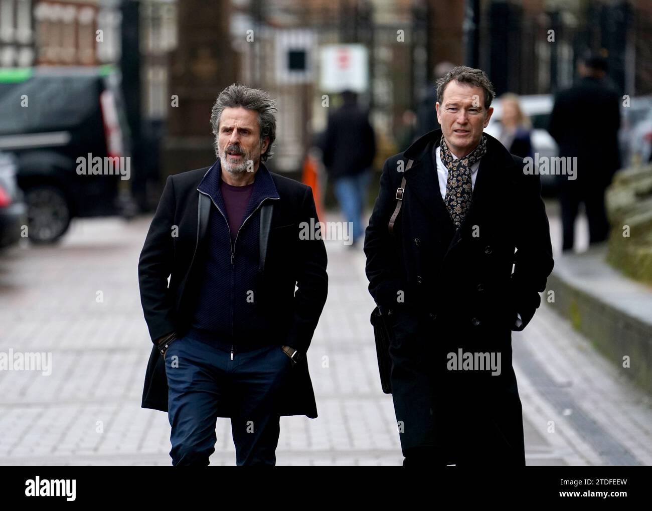 Con O'Neill (left) and Nick Moran arrive ahead of a memorial service at ...