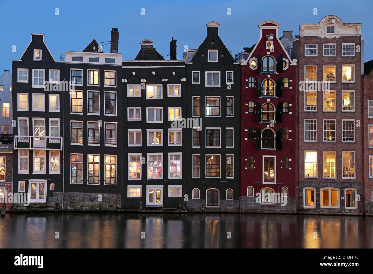 The Damrak Canal Houses of Amsterdam offer some of the most picturesque ...