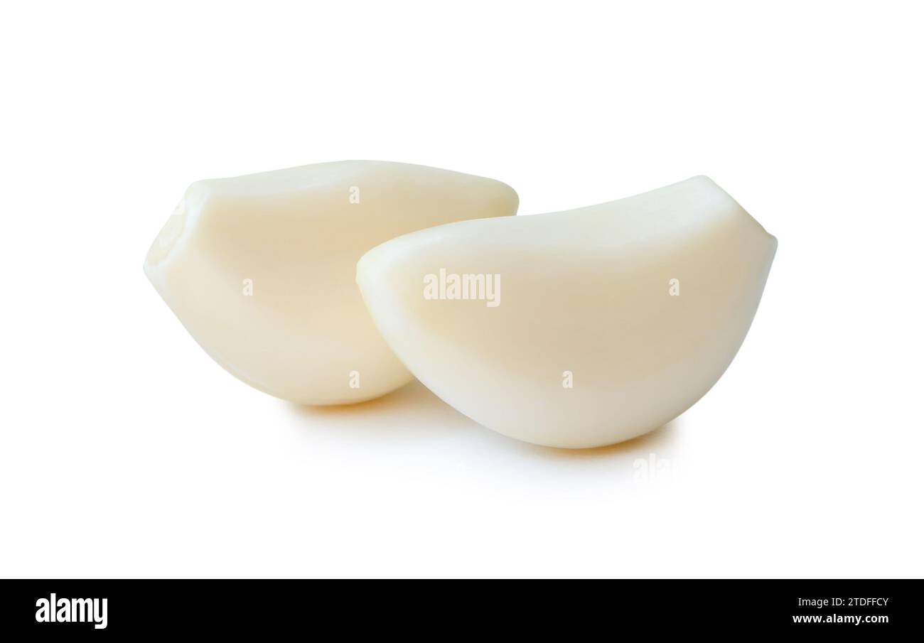 Front view of fresh garlic cloves in stack are isolated on white ...