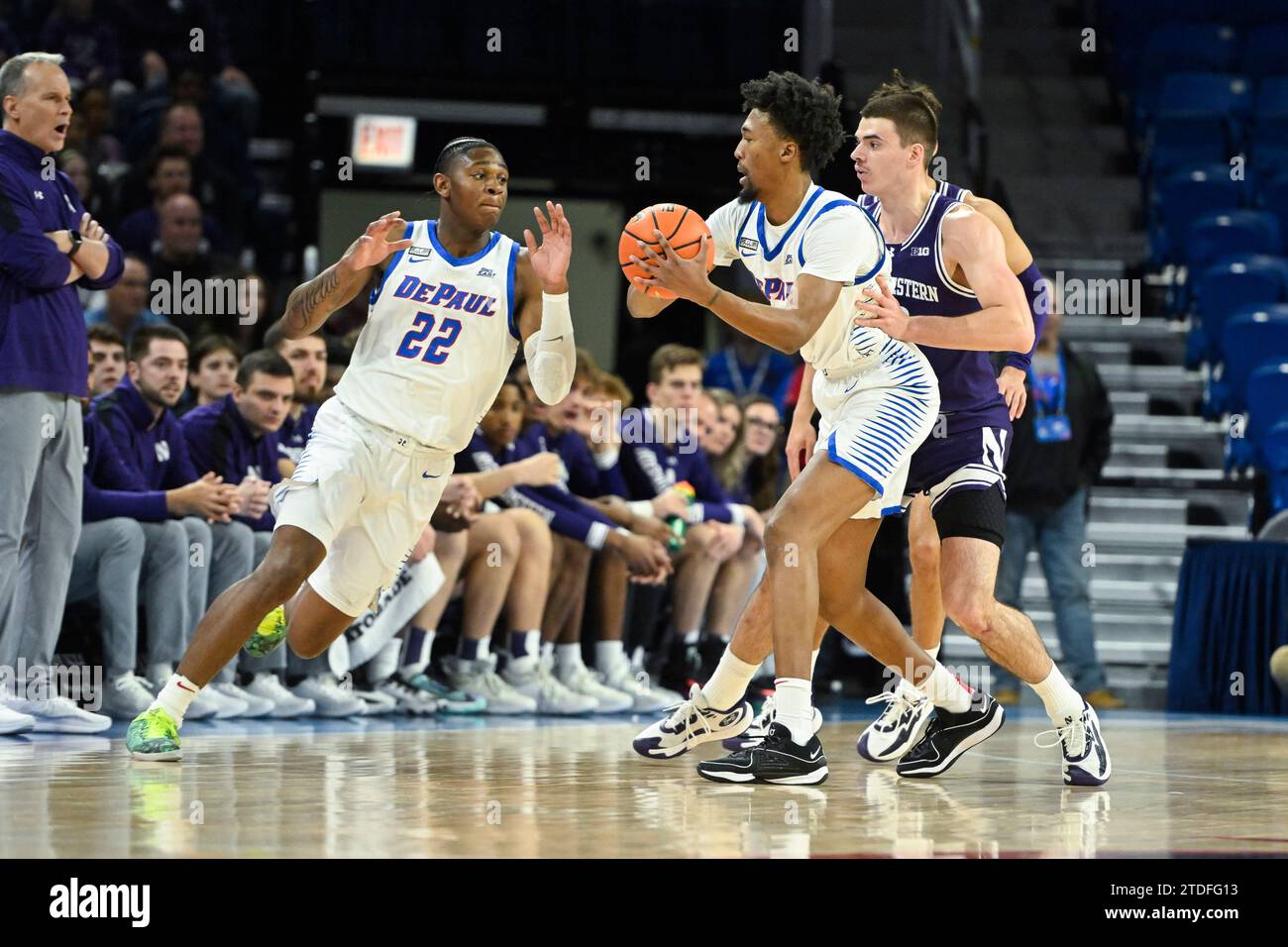DePaul Blue forward Jeremiah Oden, right, passes the ball to guard ...
