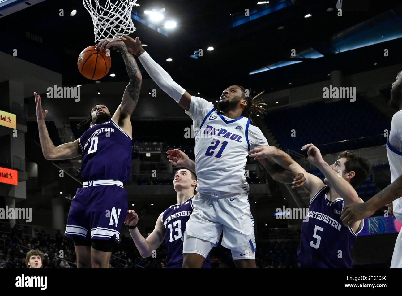 Northwestern guard Boo Buie (0) and DePaul forward Da'Sean Nelson (21 ...