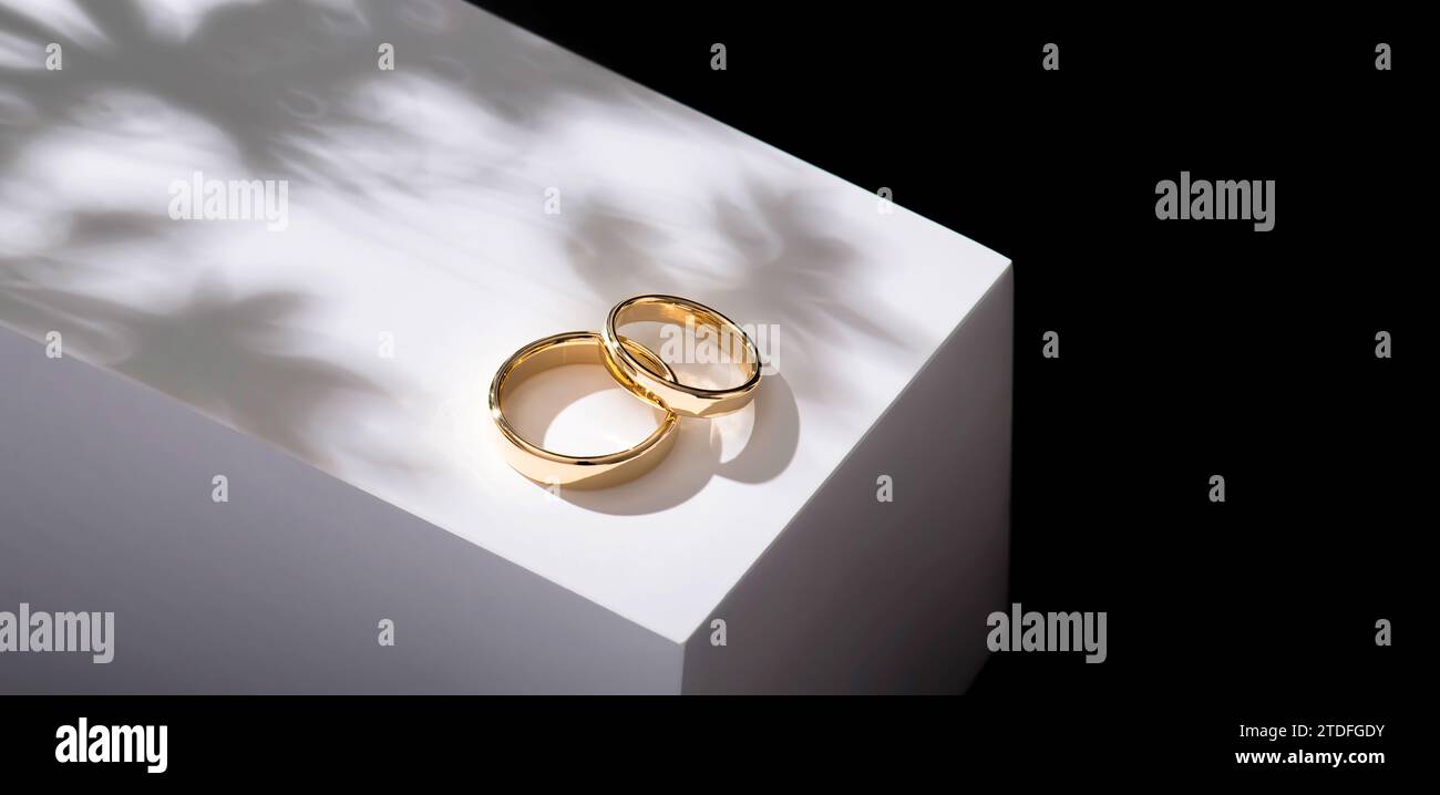 Gold wedding rings with shadow hi-res stock photography and images - Alamy