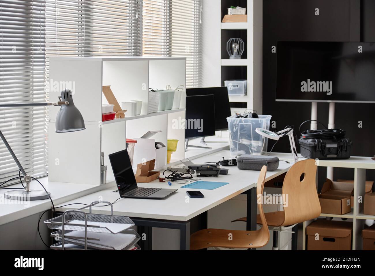 Side view background image of tech repair workshop with various tools ...