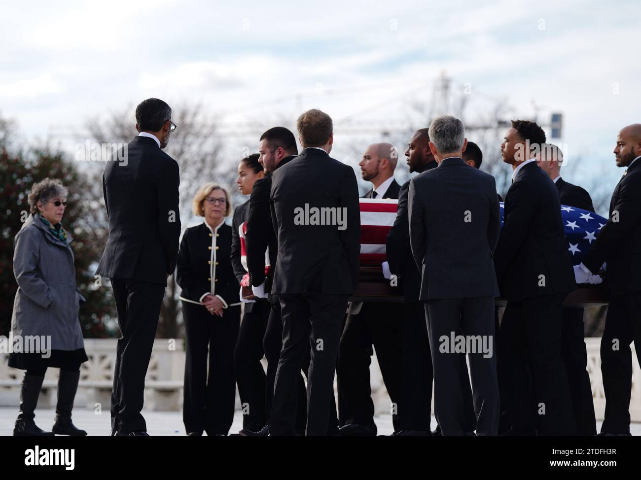 Washington, United States. 18th Dec, 2023. The flag-draped casket of ...